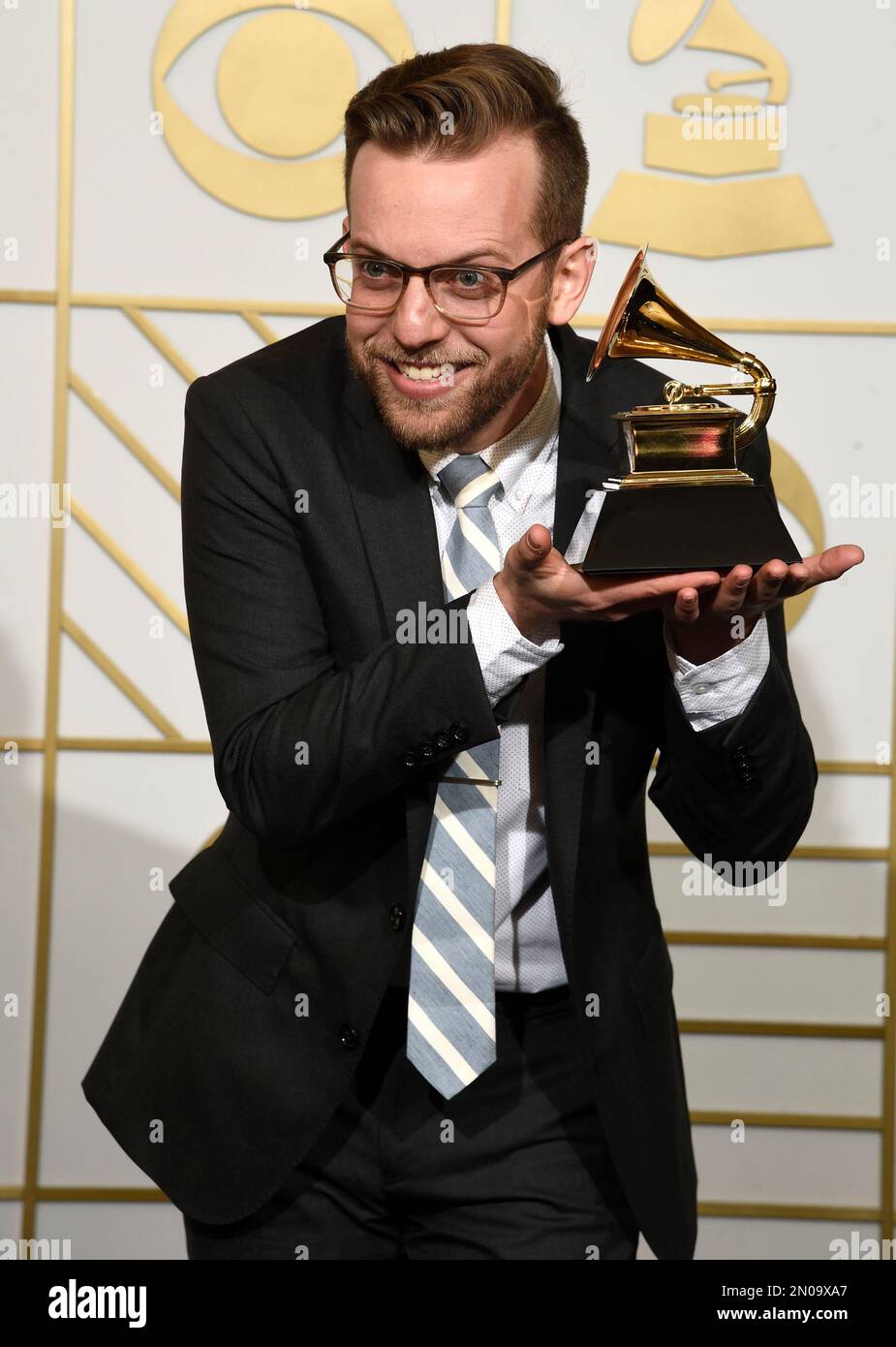 Ben Bram poses in the press room with the award for best arrangement ...