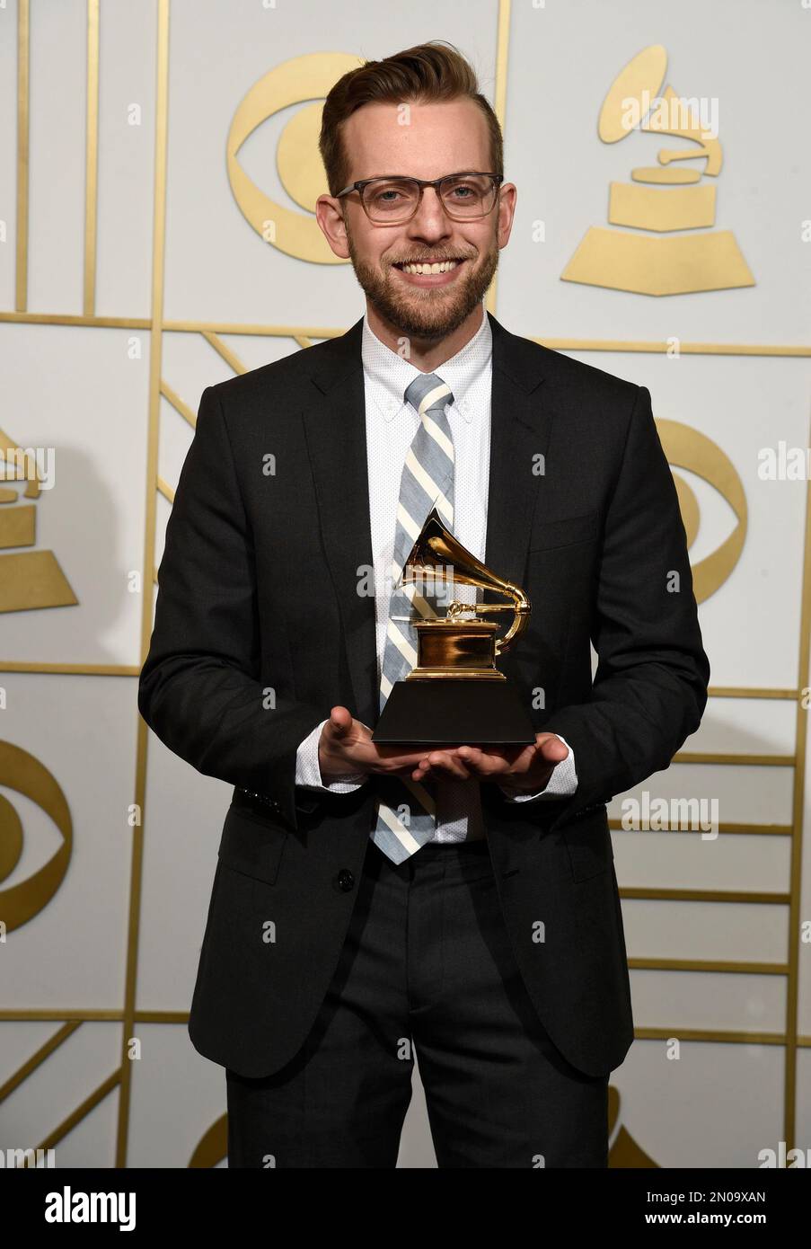 Ben Bram poses in the press room with the award for best arrangement ...