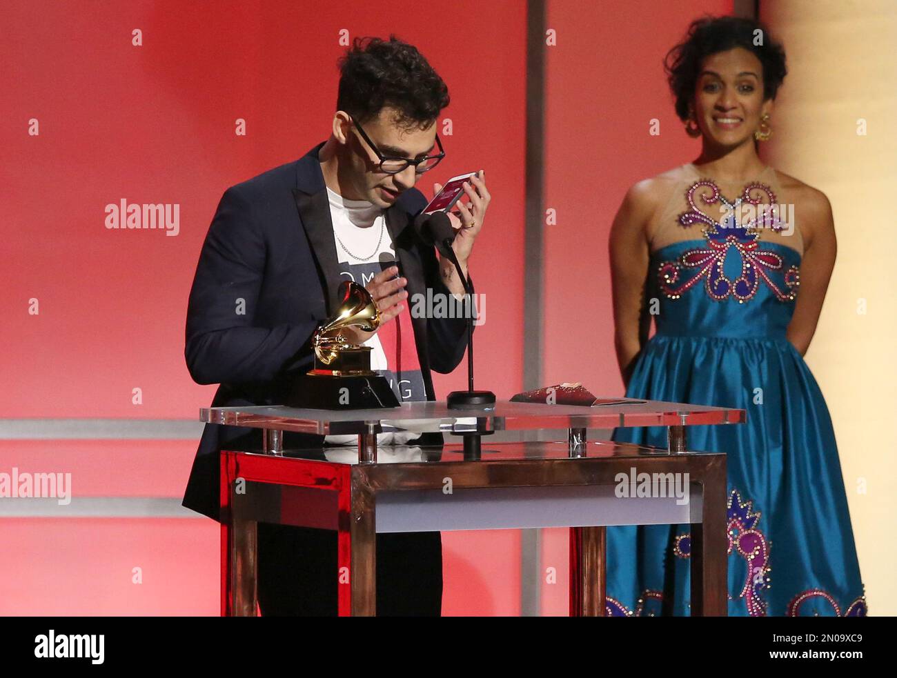 Jack Antonoff, left, calls Taylor Swift as he accepts their award for ...