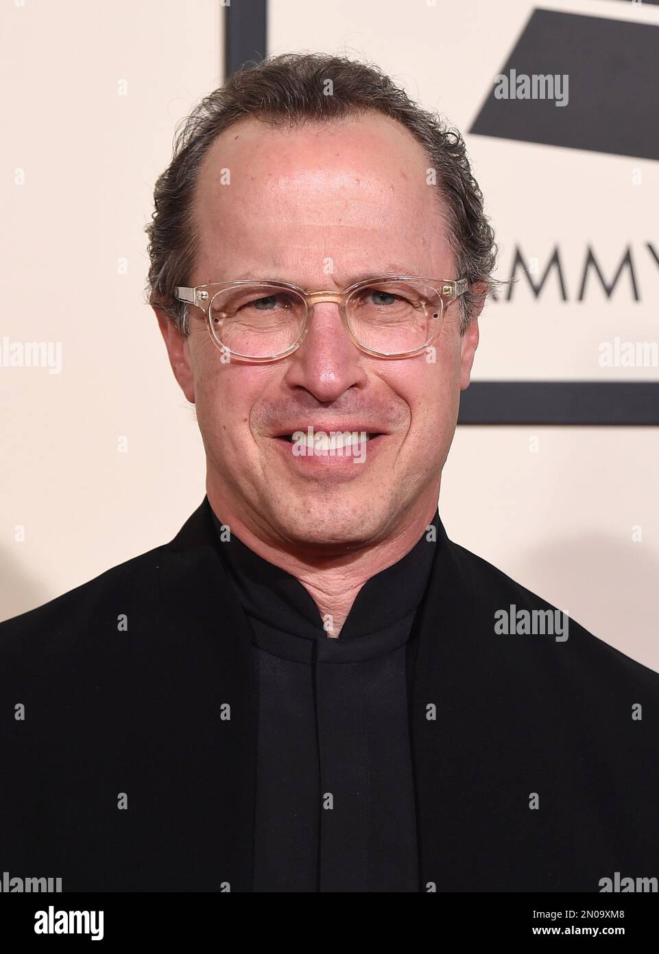 David Alan Miller arrives at the 58th annual Grammy Awards at the ...
