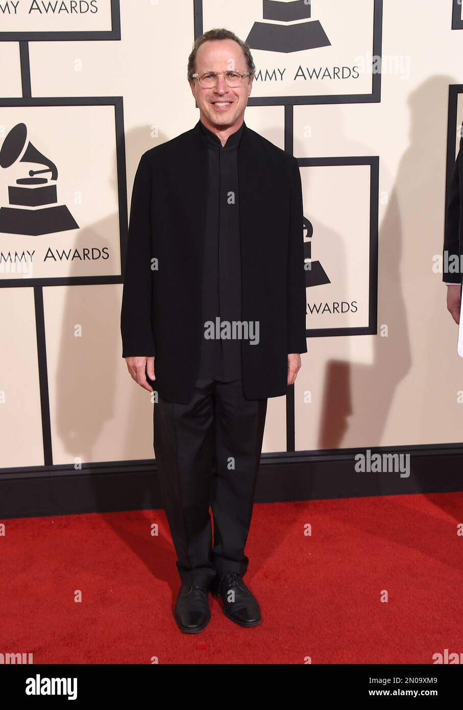 David Alan Miller arrives at the 58th annual Grammy Awards at the ...