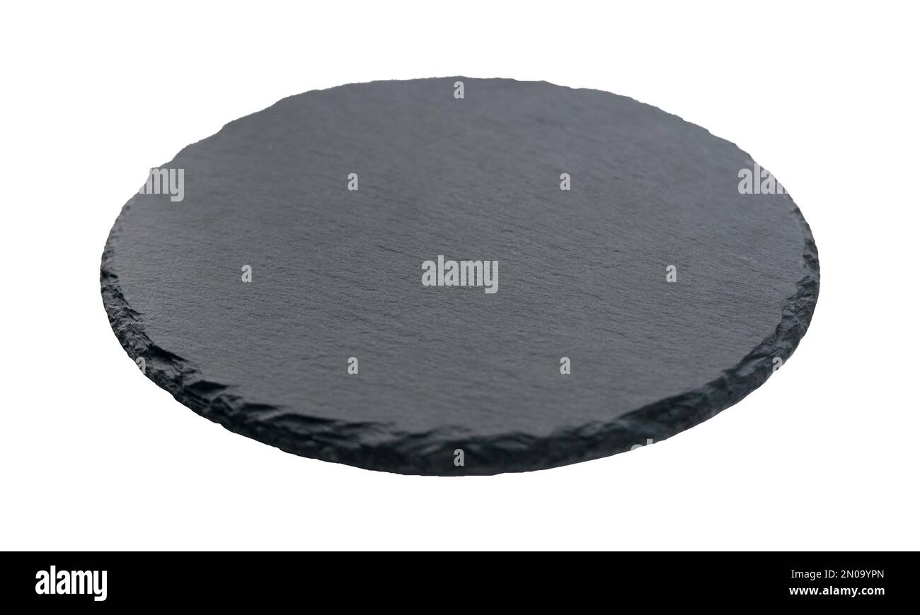 Selective focus of black slate round stone isolated on white background ...