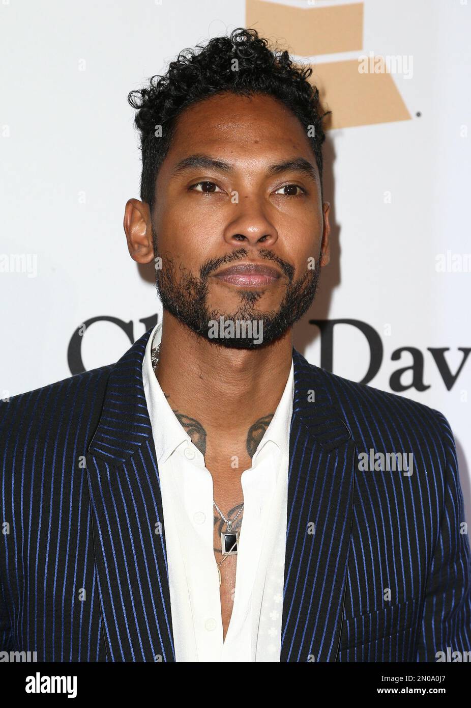 Miguel arrives at the 2016 Clive Davis Pre-Grammy Gala at the Beverly ...