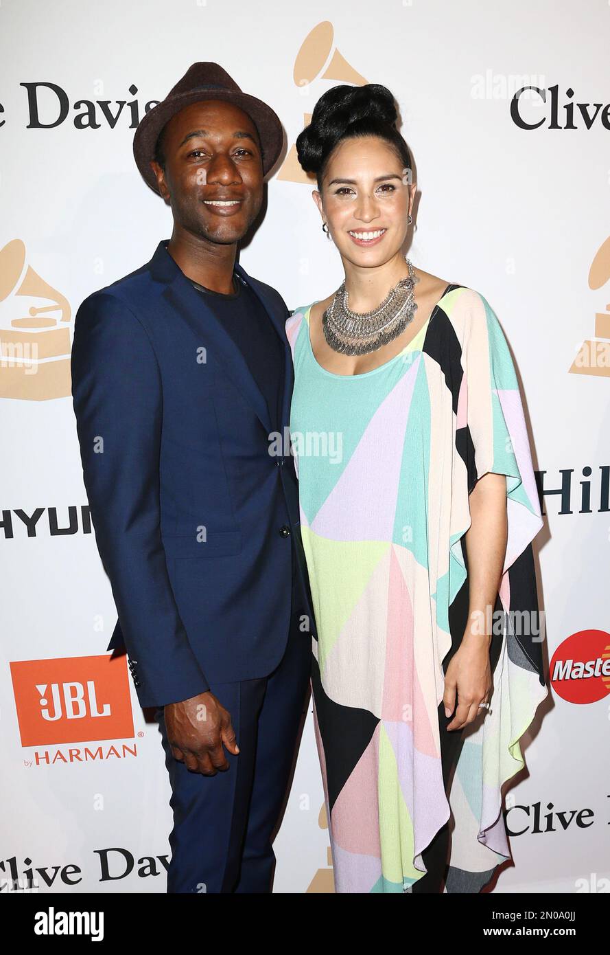 Aloe Blacc, left, and Maya Jupiter arrive at the 2016 Clive Davis Pre ...