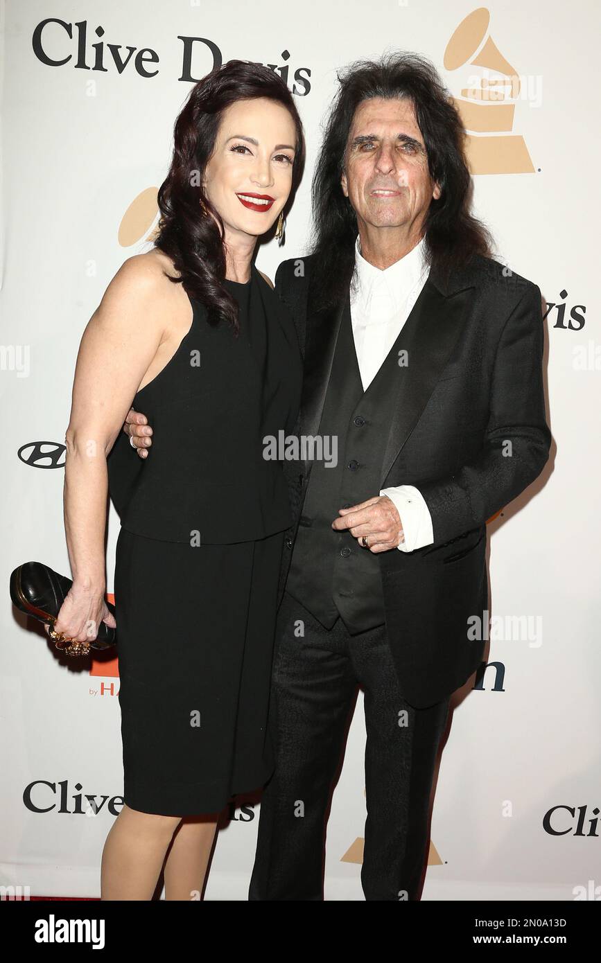 Sheryl Goddard, left, and Alice Cooper arrive at the 2016 Clive Davis ...