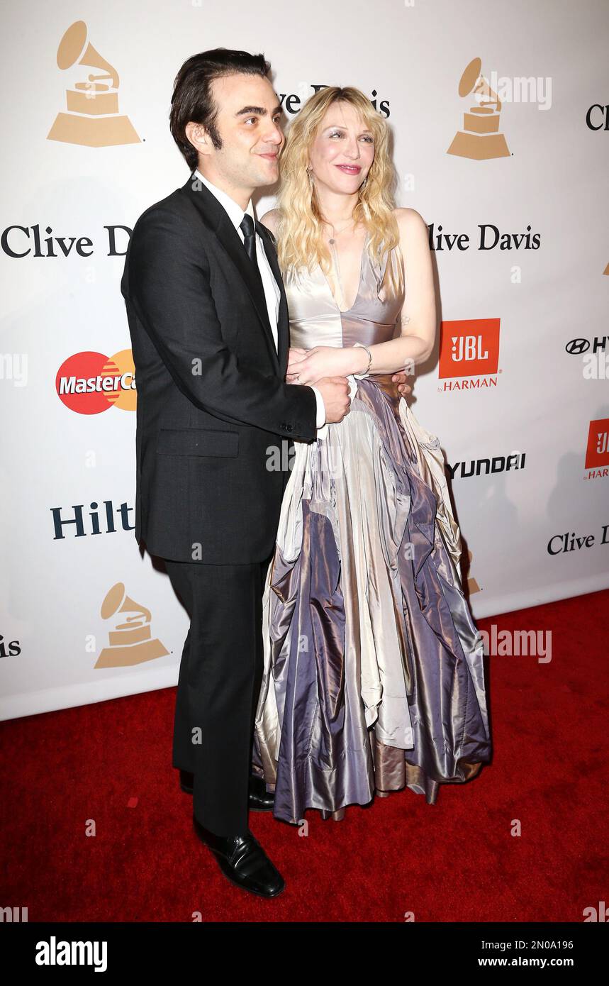 Nicholas Jarecki, left, and Courtney Love arrive at the 2016 Clive ...