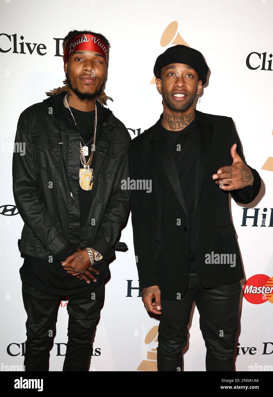 Fetty Wap, left, and Ty Dolla $ign arrive at the 2016 Clive Davis Pre ...