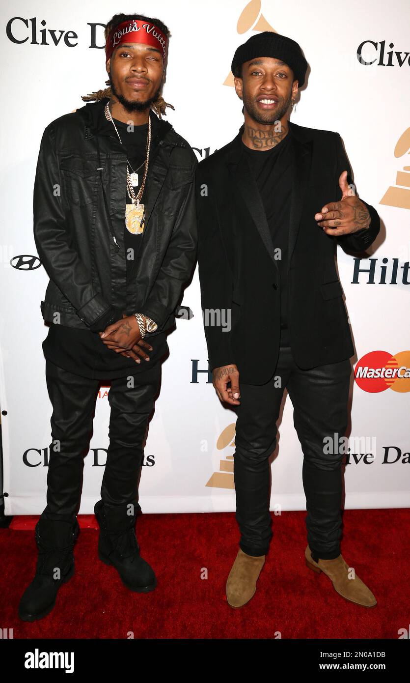 Fetty Wap, left, and Ty Dolla $ign arrive at the 2016 Clive Davis Pre ...