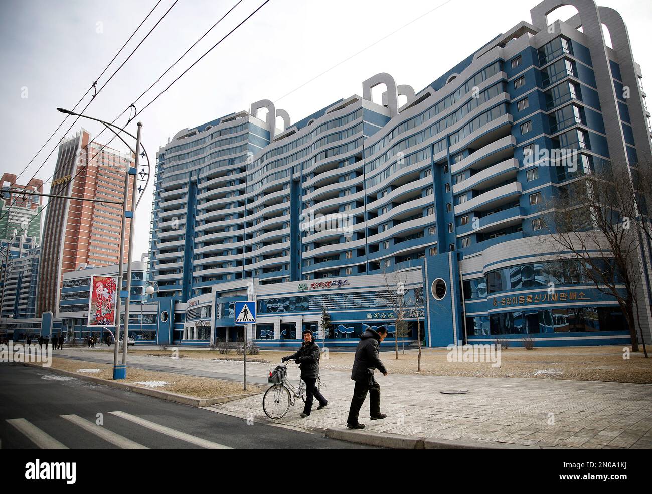 North Koreans cross a road at the Mirae Scientists street, Pyongyang's ...