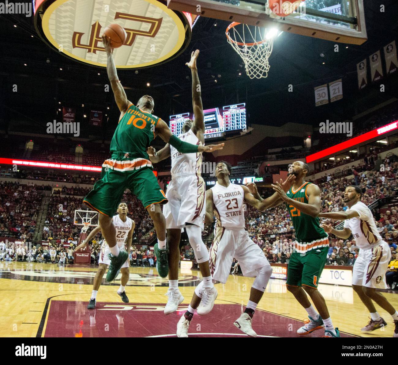 Miami guard Sheldon McClellan (10) shoots over Florida State guard ...