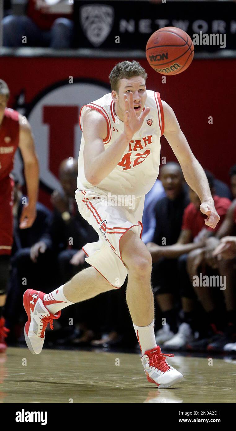 Utah forward Jakob Poeltl (42) drives up court during the second half ...