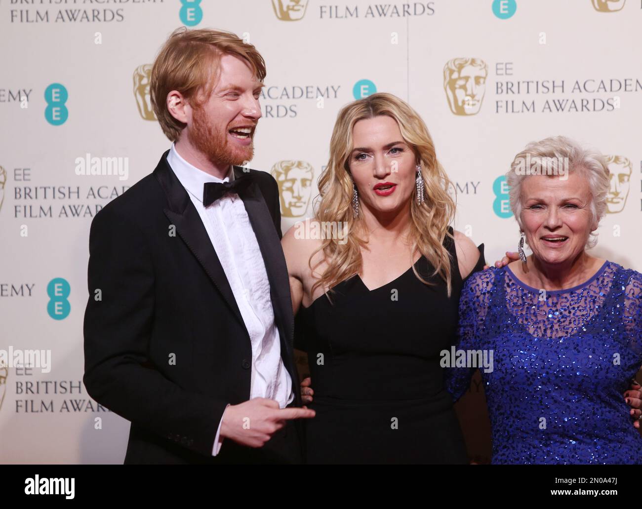 Actors from left, Domhnall Gleeson, Kate Winslet and Julie Walters pose ...