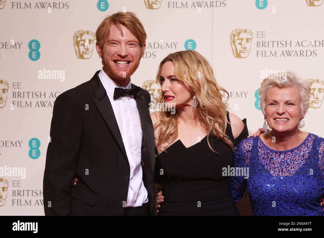 Actors from left, Domhnall Gleeson, Kate Winslet and Julie Walters pose ...
