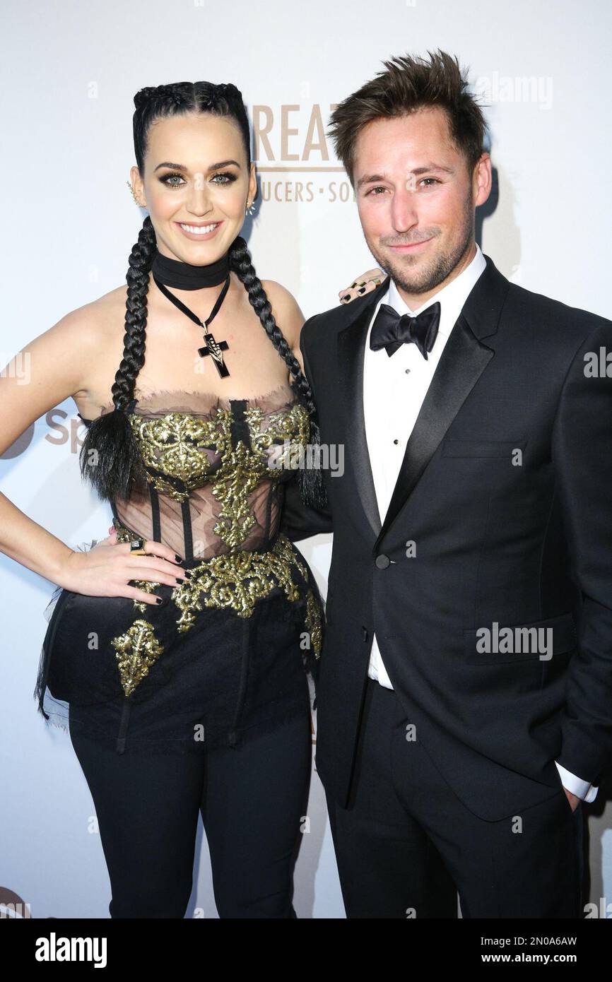 Katy Perry, left, and Mark Williamson arrive at Spotify Presents The ...