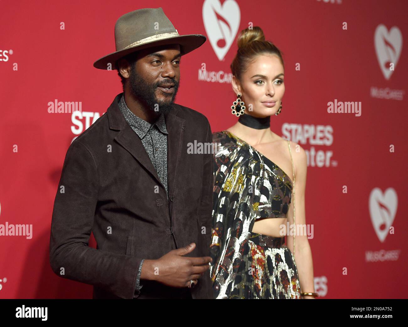 Gary Clark Jr., left, and Nicole Trunfio arrive at the MusiCares Person ...