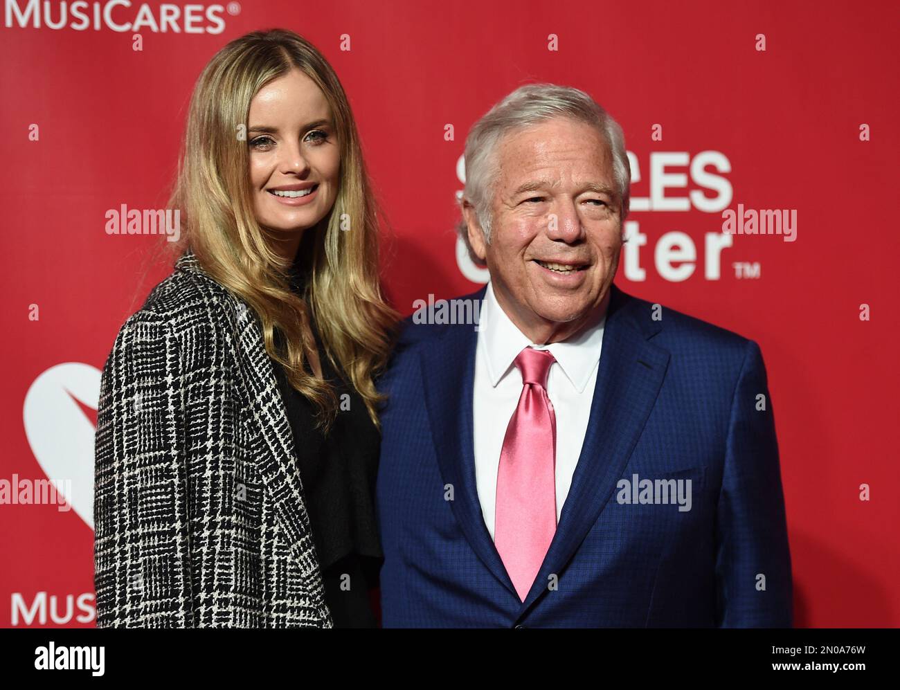 Ricki Lander,left, and Robert Kraft arrive at the MusiCares Person of ...