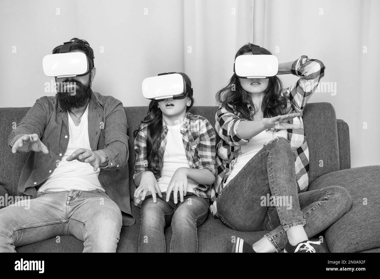 mom dad and daughter. digital future and innovation. modern life Stock ...
