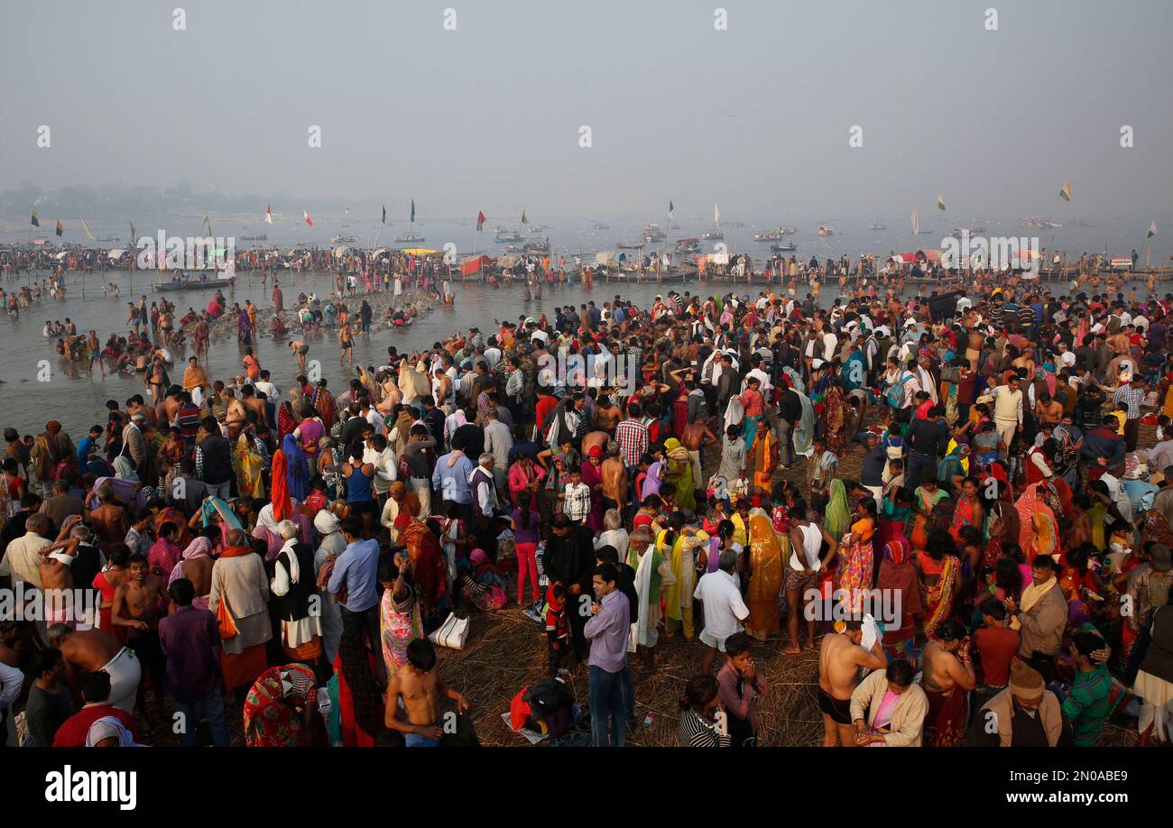 Hindu devotees gather to take a holy dip at Sangam, confluence of ...
