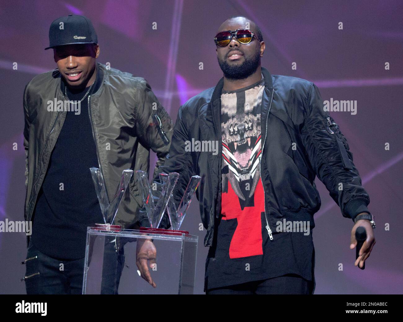 French rapper Gandhi Djuna "Maitre Gims", right, gestures after ...