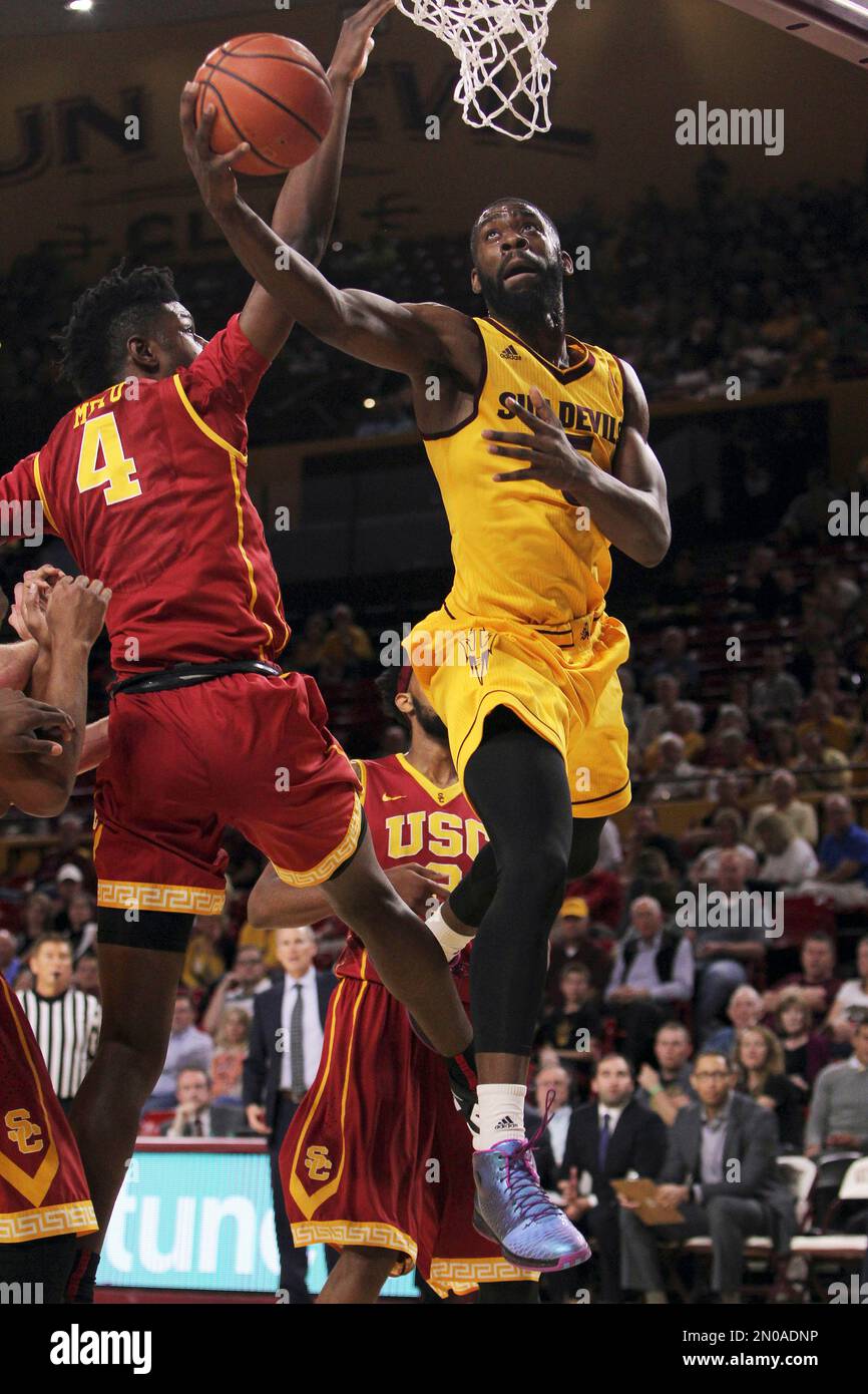 Arizona State forward Obinna Oleka, right, goes up to the basket ...