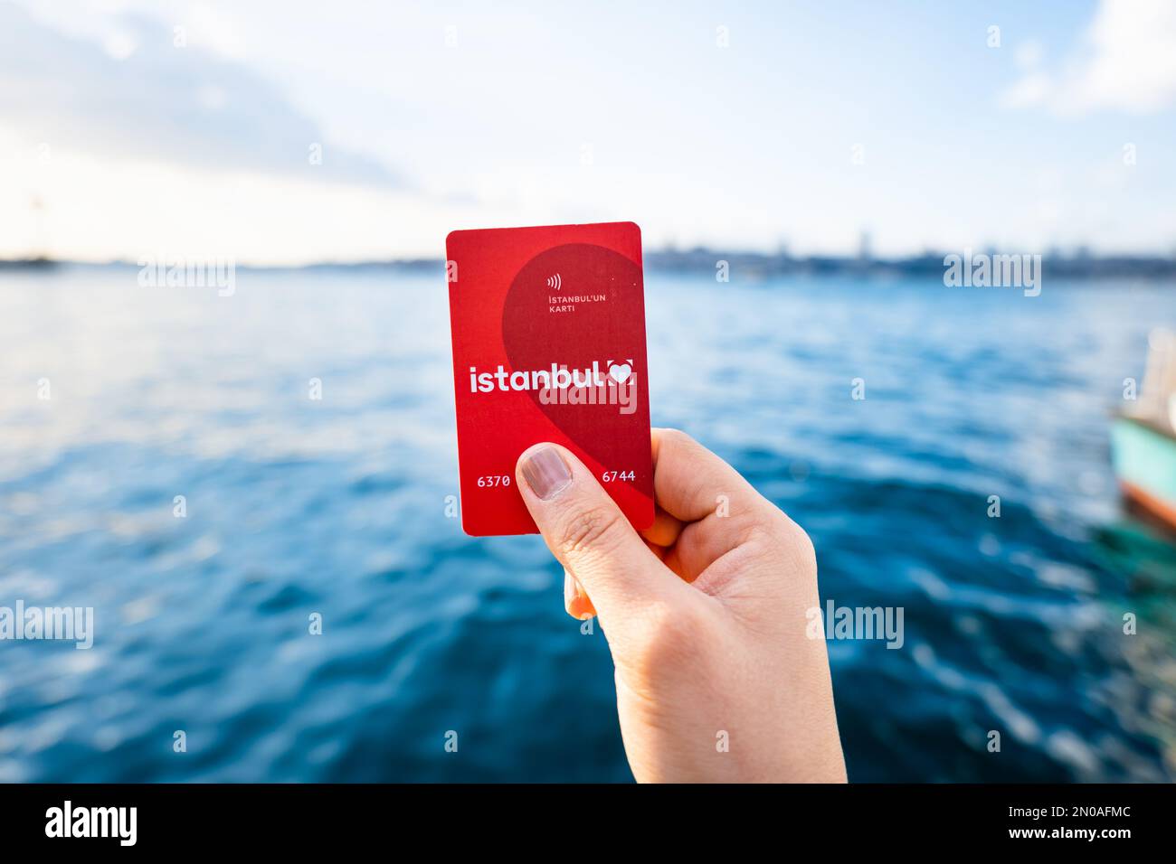 Istanbul, Turkey - February 2023: Istanbul Card in tourist's hand. It's ...