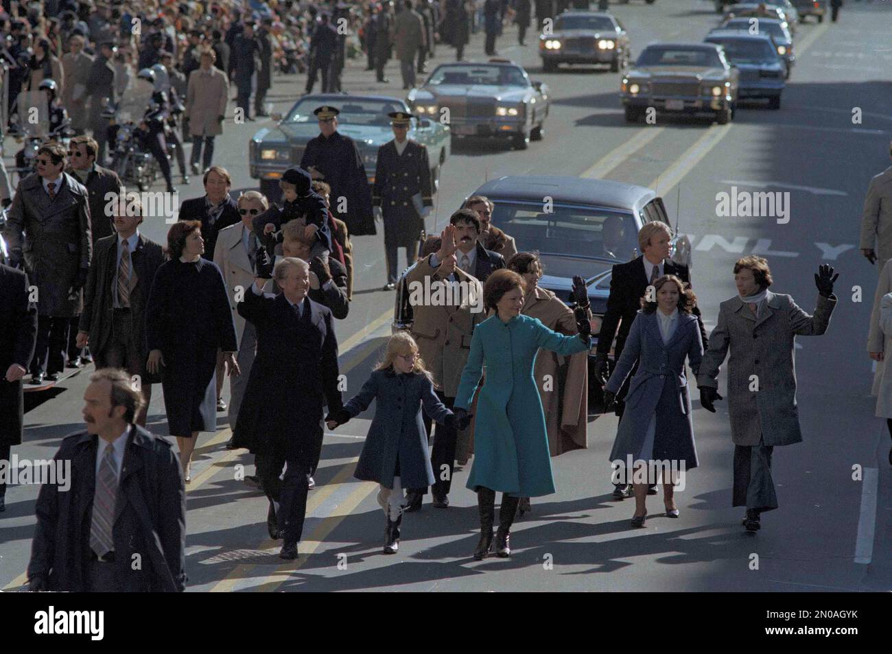 President Jimmy Carter and new first lady Rosalynn Carter, walk down ...