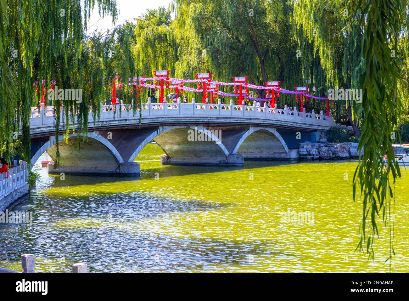 Joyous pavilion park arch bridge Stock Photo - Alamy
