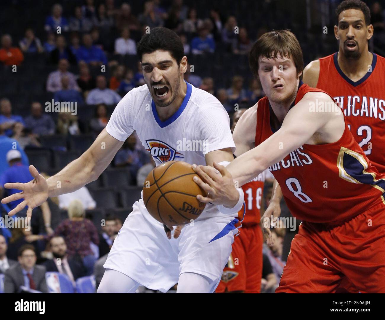 Oklahoma City Thunder center Enes Kanter, left, and New Orleans ...