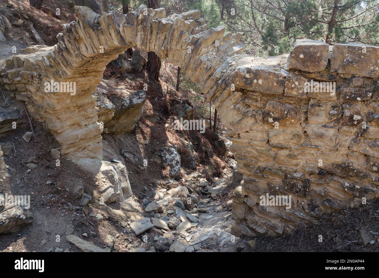Old Small bridge aqueduct in mountain in spring. More than hundred ...