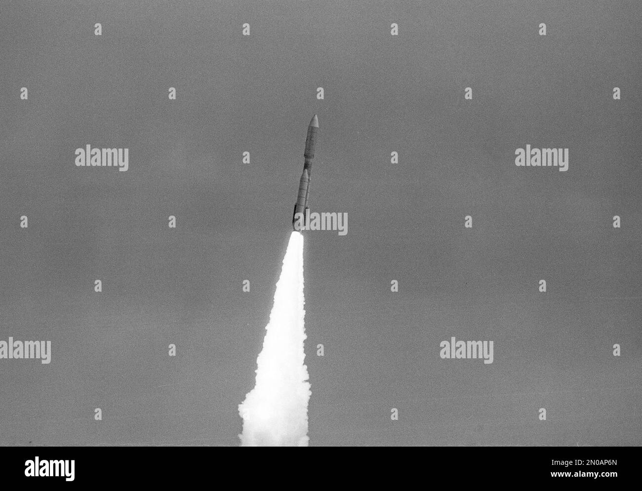 The Titan Centaur rocket rises in the sky on a tail of fire from its ...