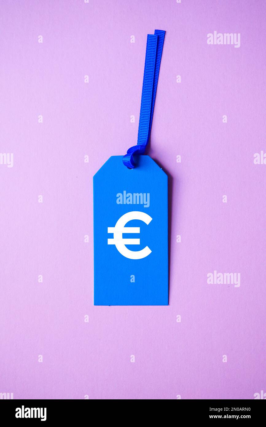 euro sign on the blue price tag for sales Stock Photo - Alamy