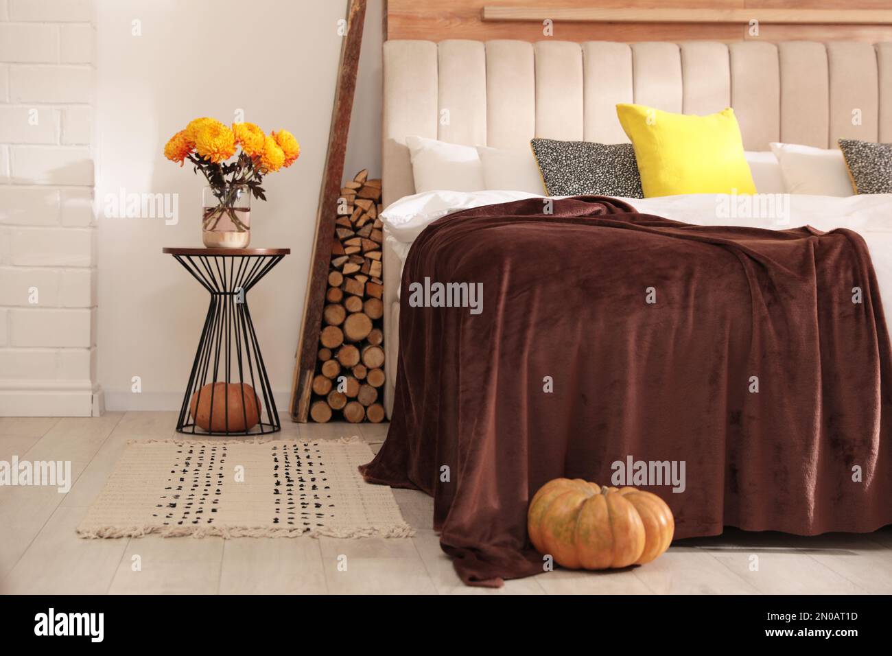 Cozy bedroom interior inspired by autumn color scheme Stock Photo - Alamy