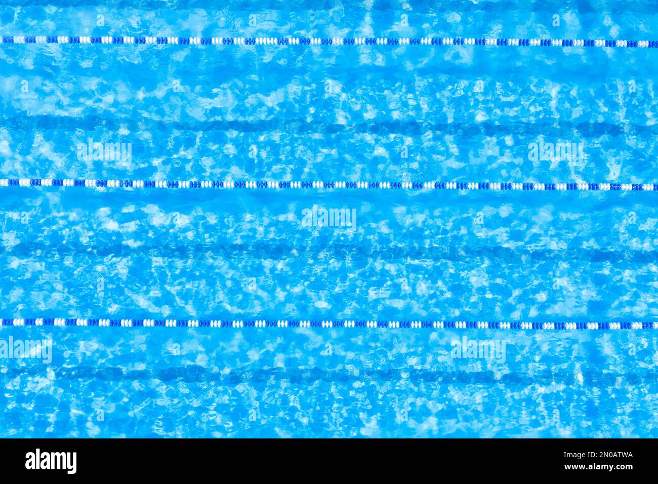 Swimming pool with racing lane dividers, top view Stock Photo - Alamy