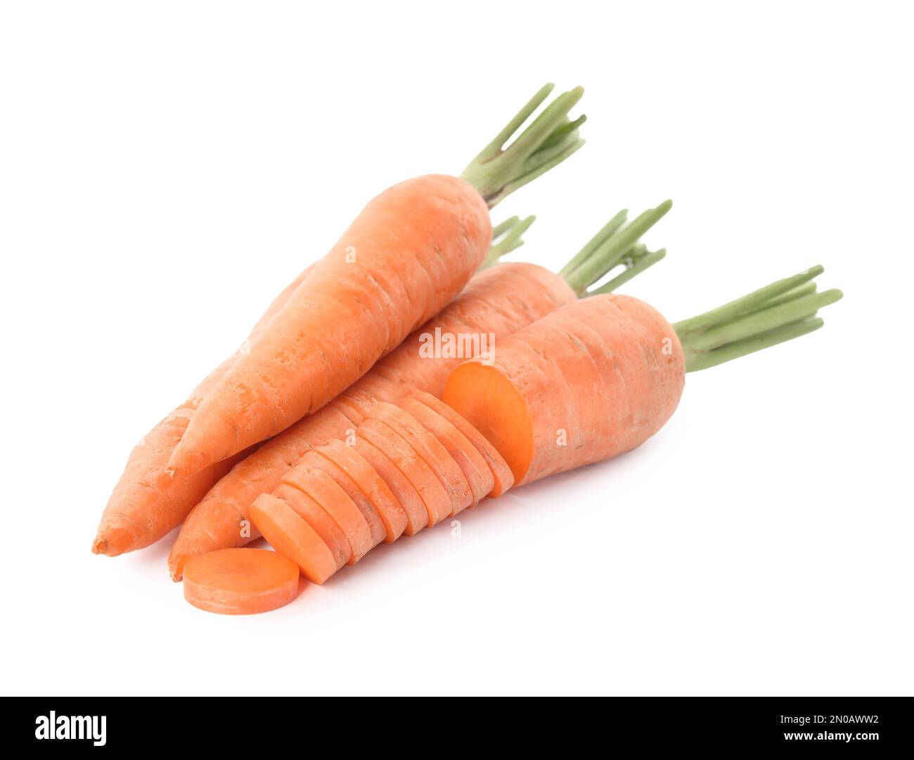 Whole and cut ripe carrots isolated on white Stock Photo - Alamy