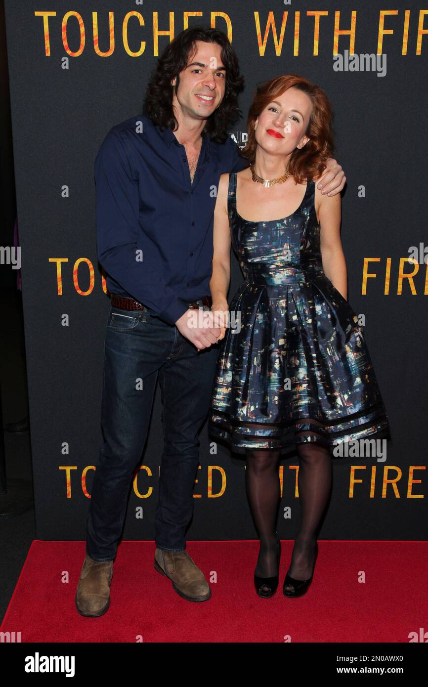 Paul Dalio, left, and Kristina Nikolova, right, attend the premiere of ...