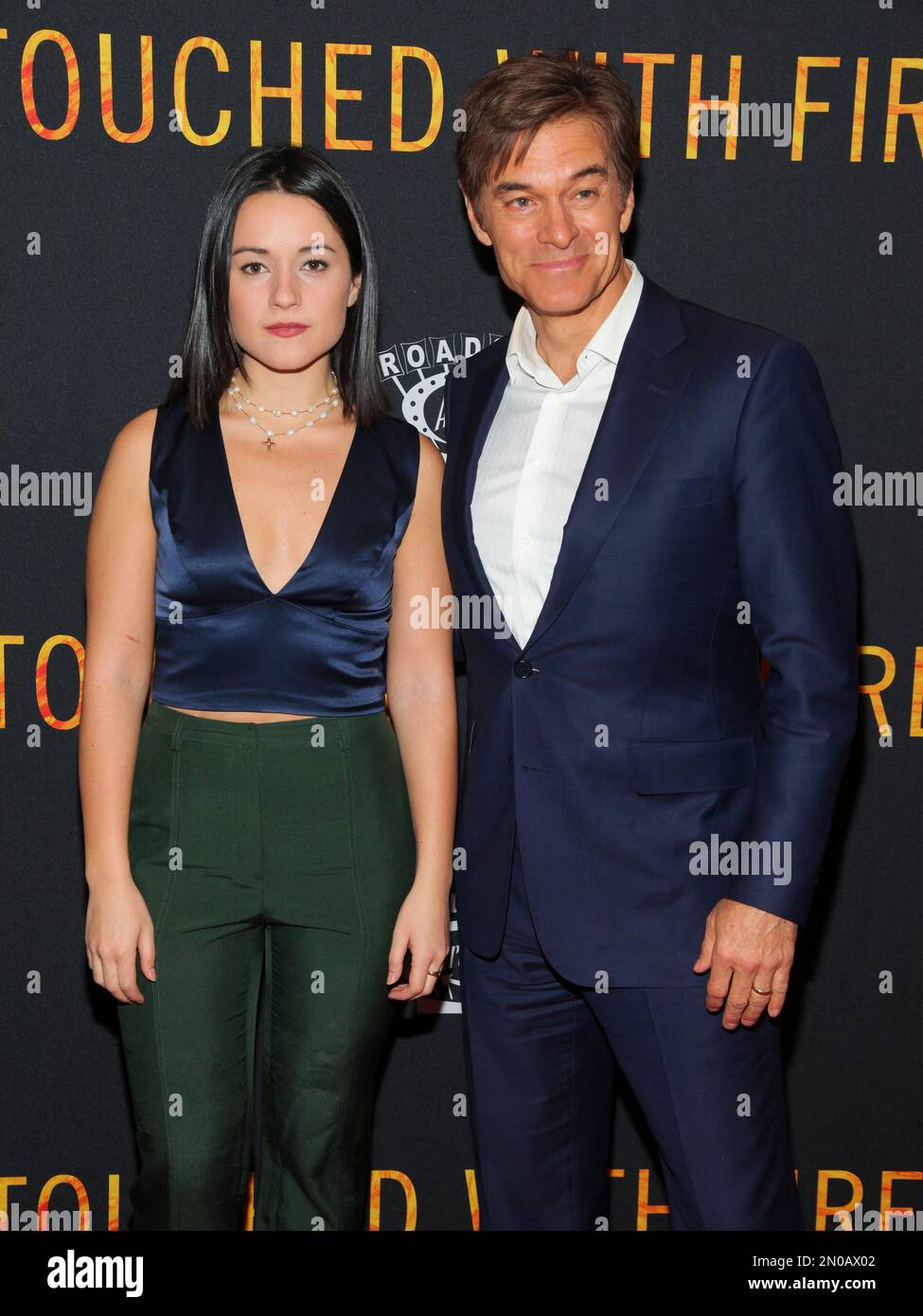 Arabella Oz, left, and Mehmet Oz, right, attend the premiere of ...
