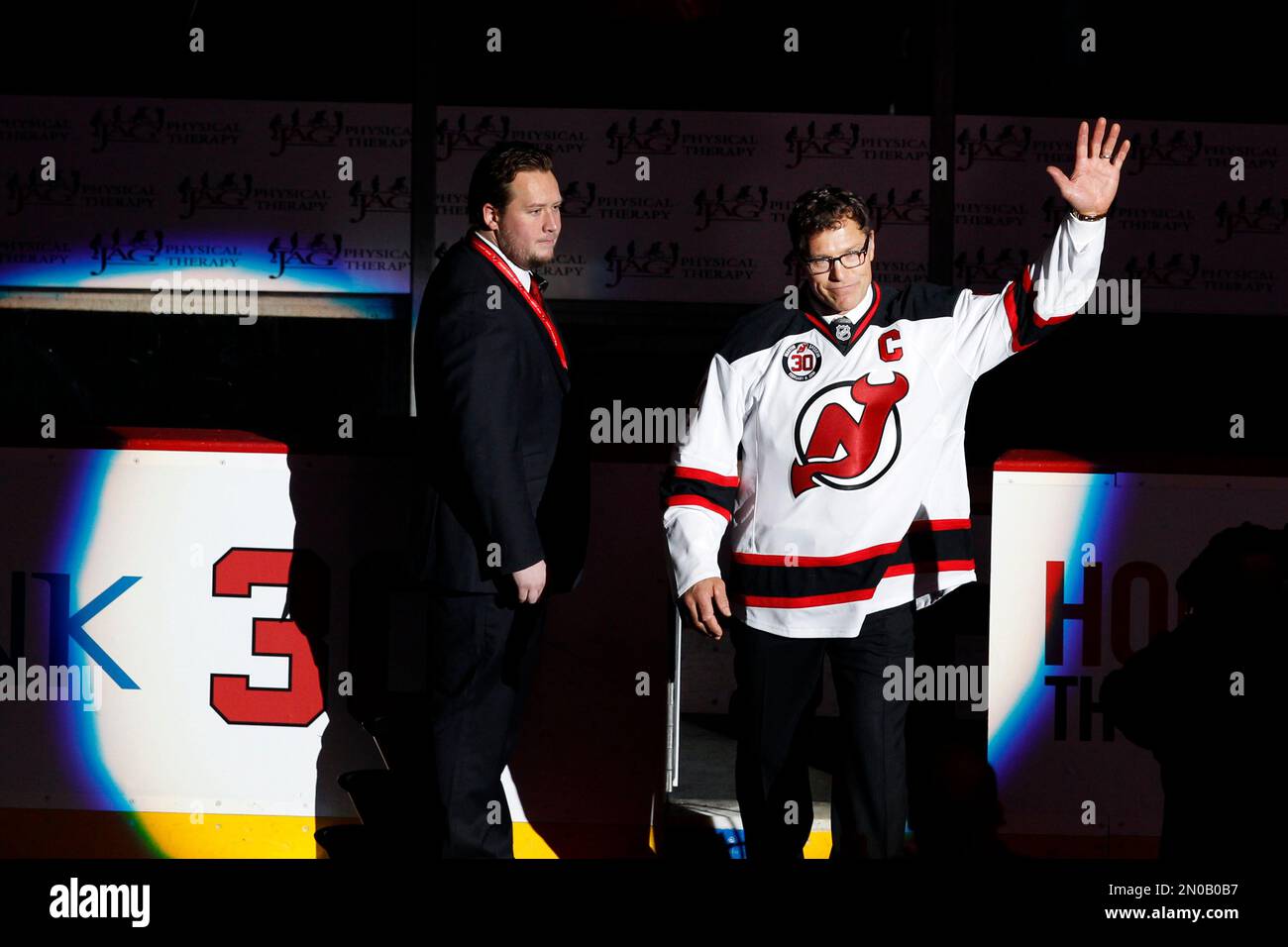 Retired New Jersey Devils defenseman Scott Stevens waves as he arrives ...