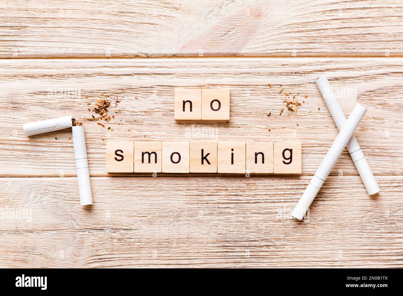 Cigarette And Wooden Blocks, Broken cigarette on table background, No ...