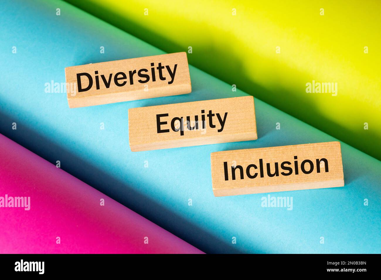 Diversity, equality, inclusion, DEI symbol, Written on wooden blocks ...