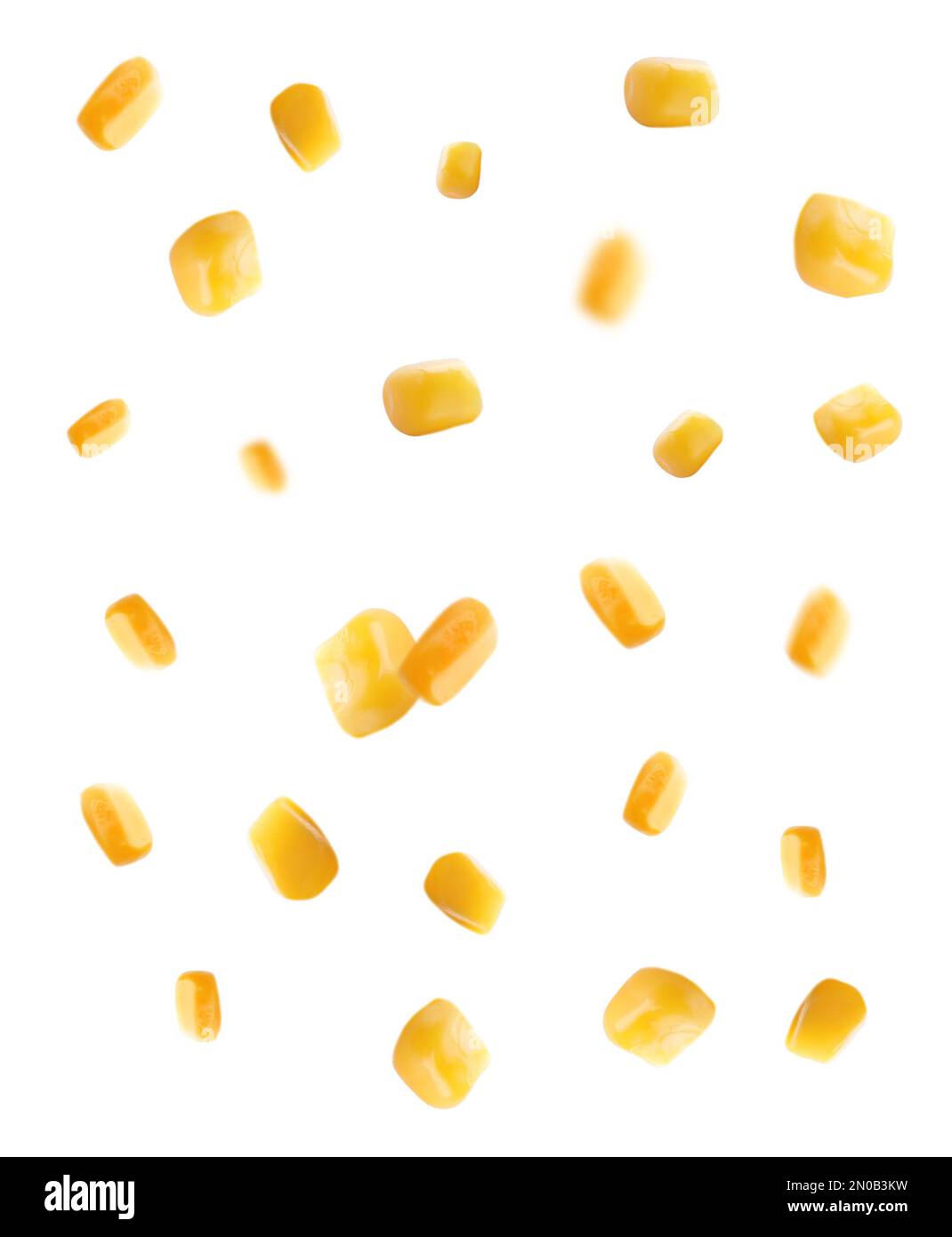 Sweet corn kernels falling on white background Stock Photo - Alamy
