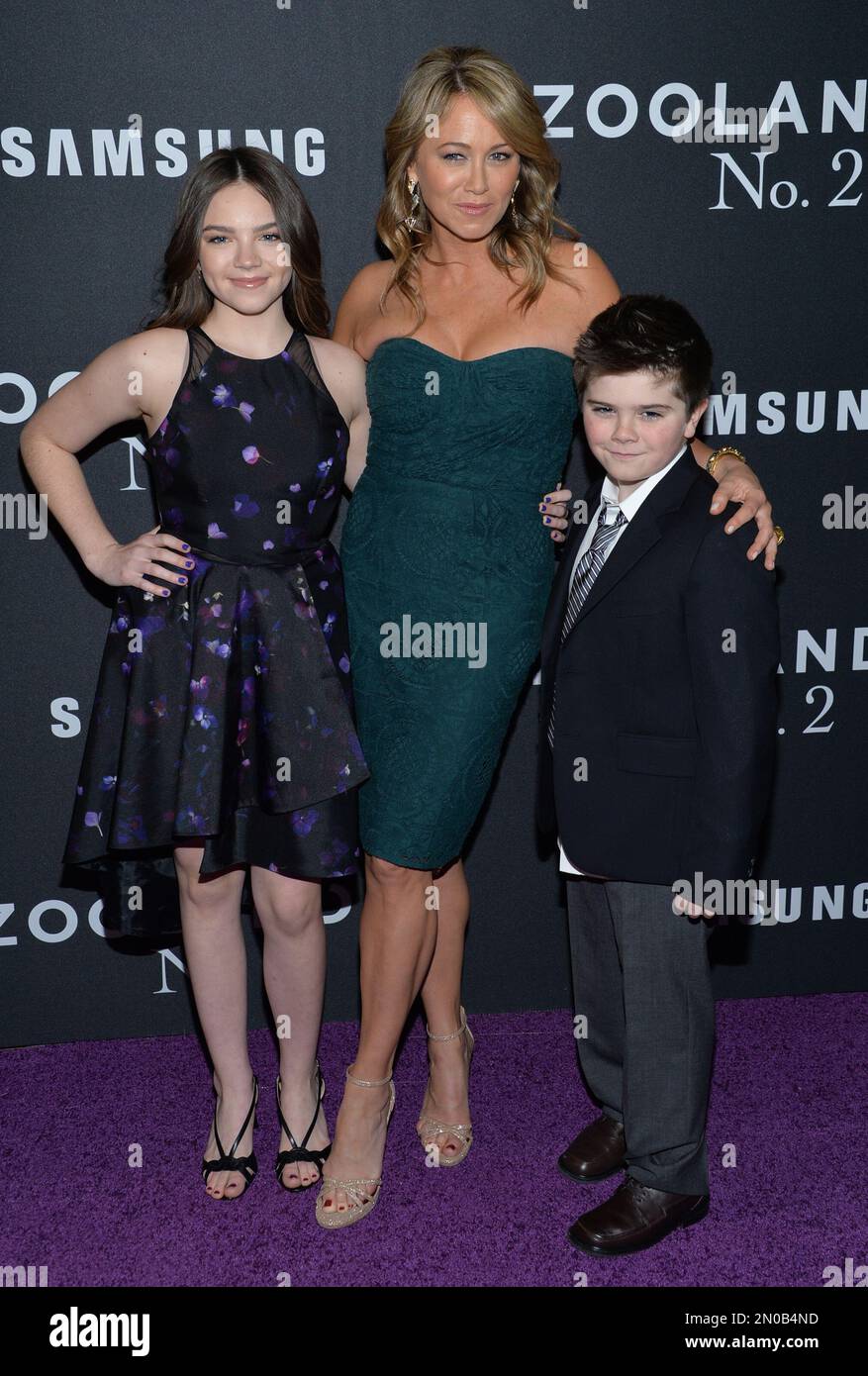 Christine Taylor, center, and her children Ella Olivia Stiller, left ...