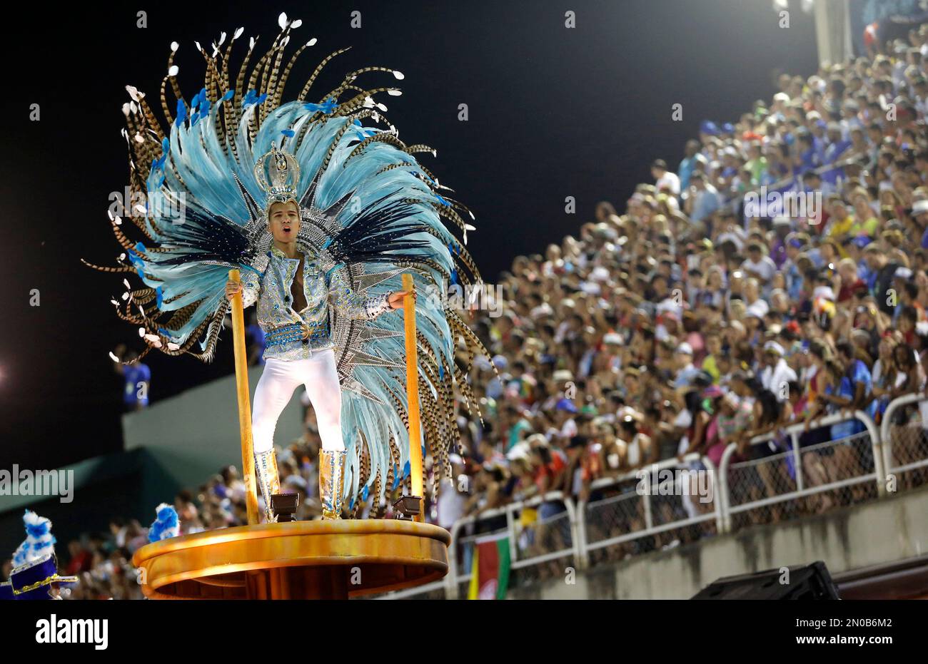 A performer from the Portela samba school parades on a float during ...