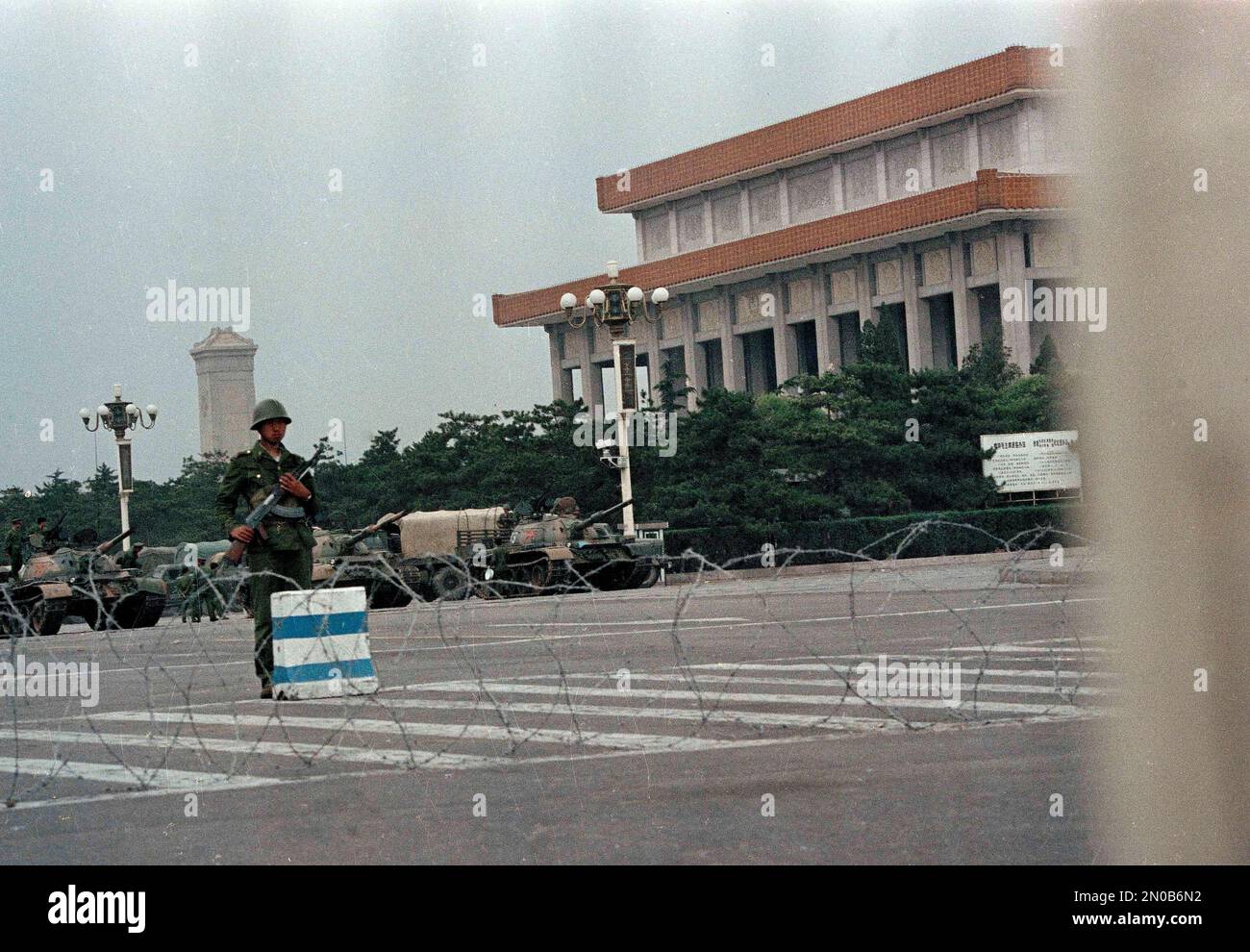 People's Liberation Army soldiers guard Tiananmen Square in Beijing ...