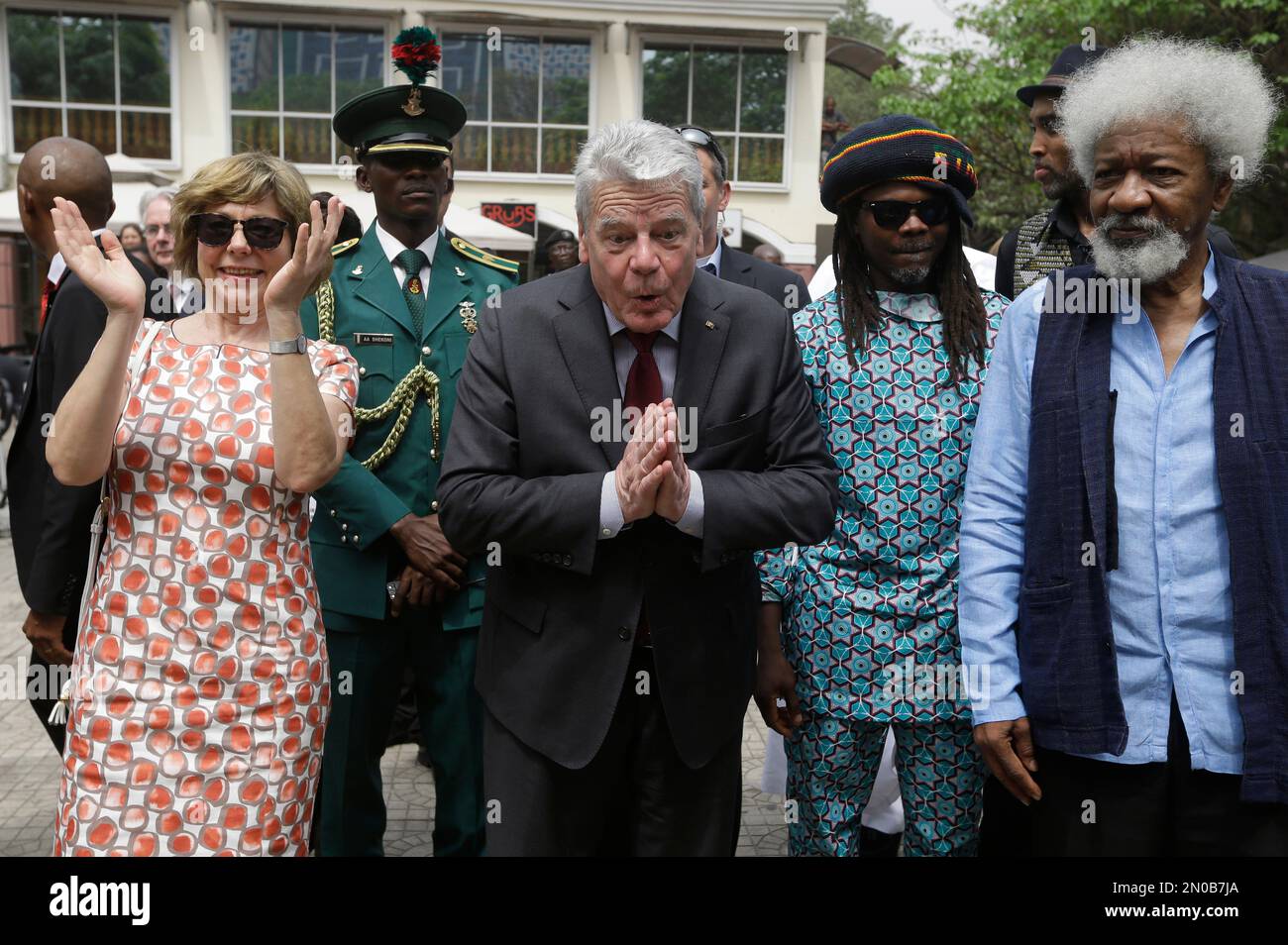 German's President, Joachim Gauck, centre, gestures next to his wife ...