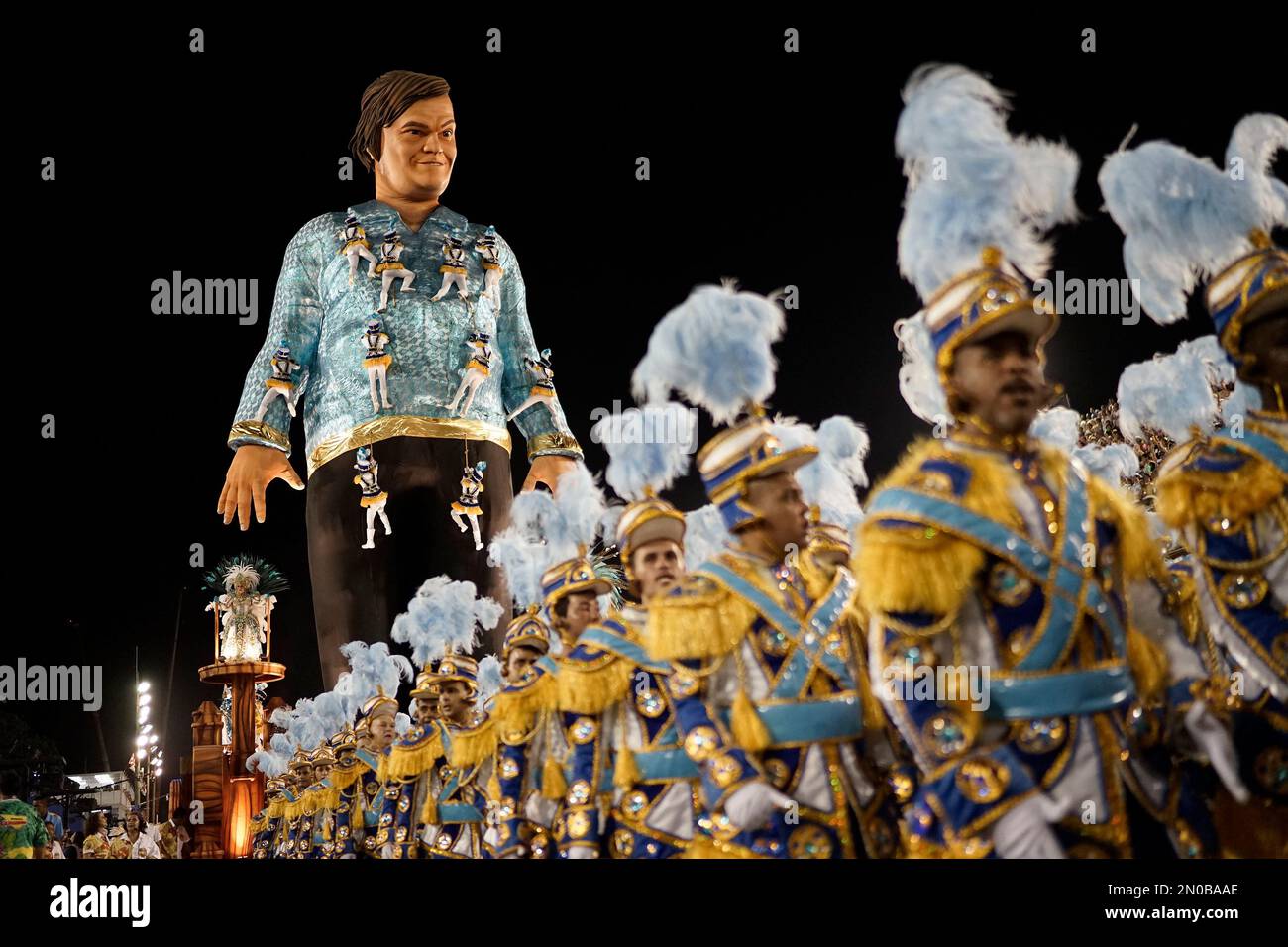 Performers from the Portela samba school parade in front of a float ...