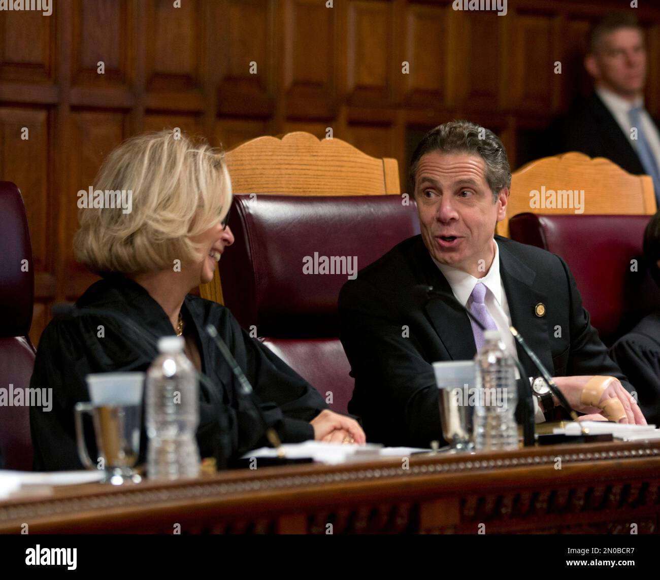 New York Gov. Andrew Cuomo, right, speaks during a swearing in ceremony ...