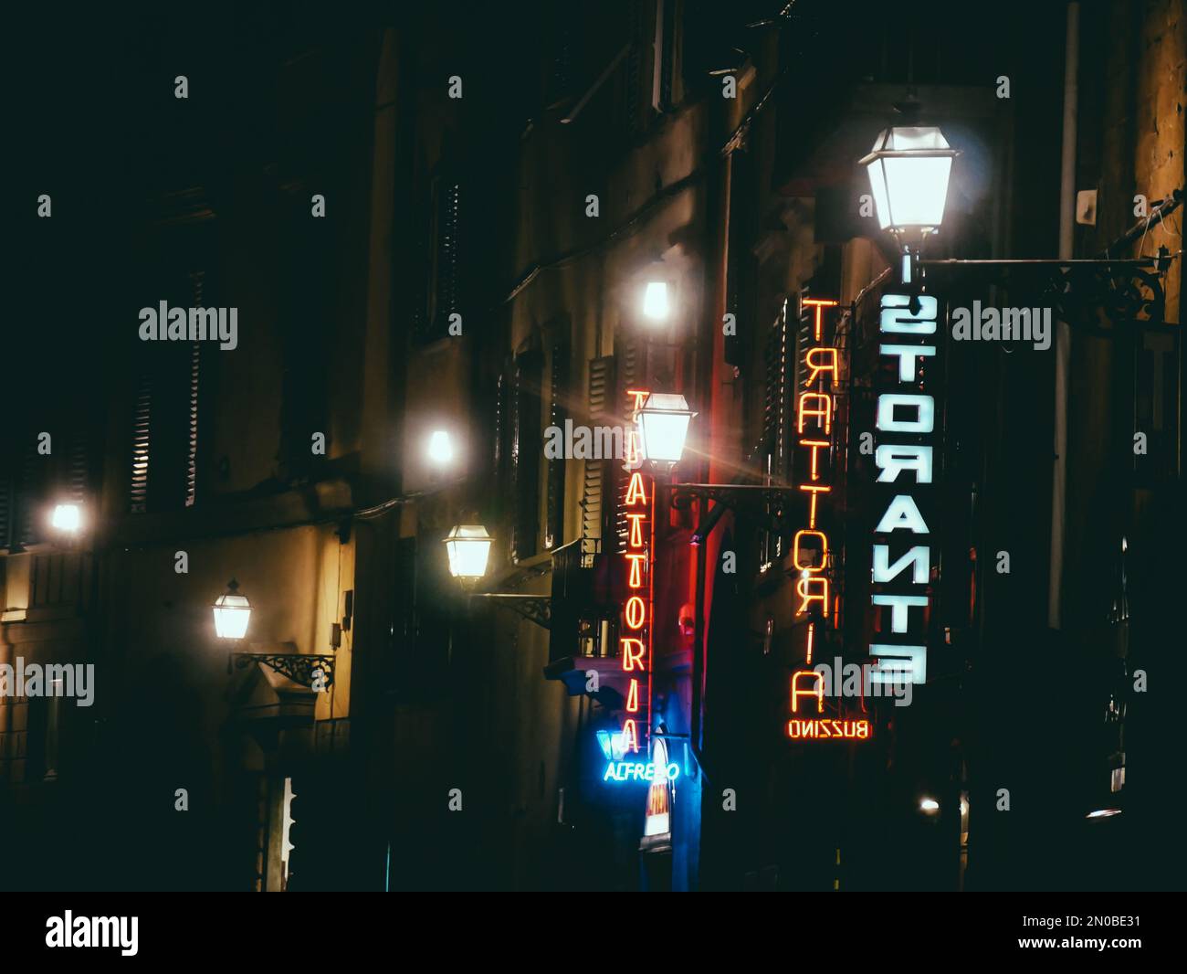 Illuminated Restaurant sign in Florence at night Stock Photo - Alamy
