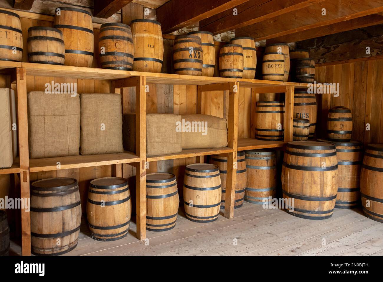 old barrels in wooden building Stock Photo - Alamy