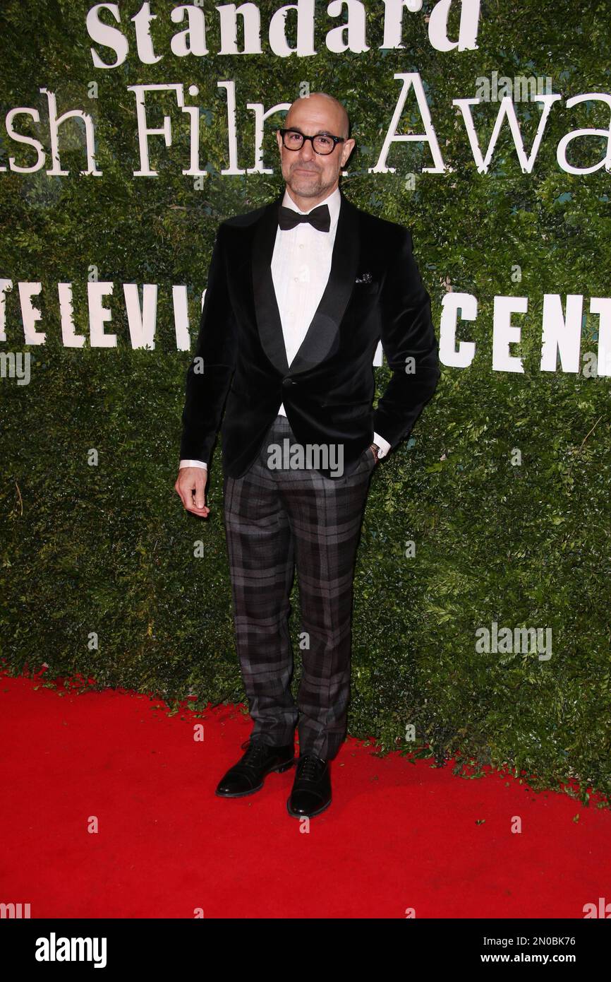 Actor Stanley Tucci poses for photographers during a photo call to ...