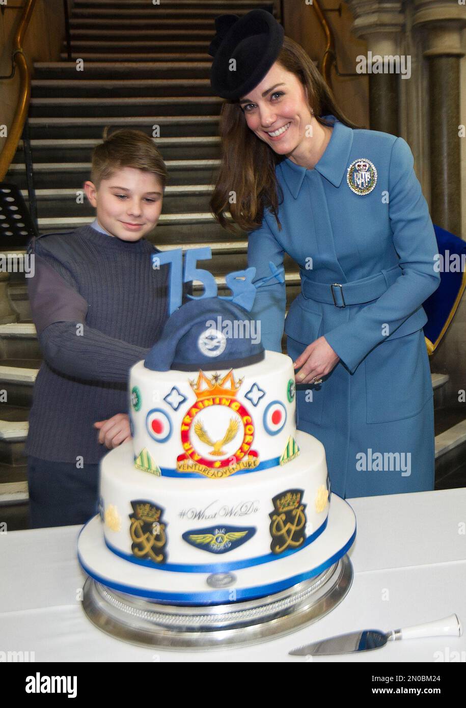 Kate, the Duchess of Cambridge poses with a young RAF Air Cadet at a ...